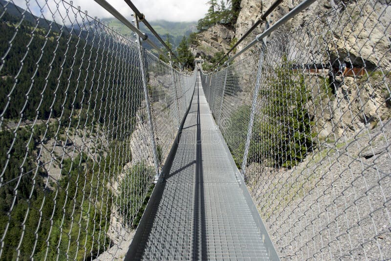 Suspension Bridge on Mountain Stock Photo - Image of mountain, bridge ...