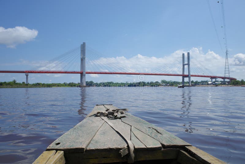 A Suspension Bridge Spanning the Amazon River Near Iquitos, Peru Stock ...
