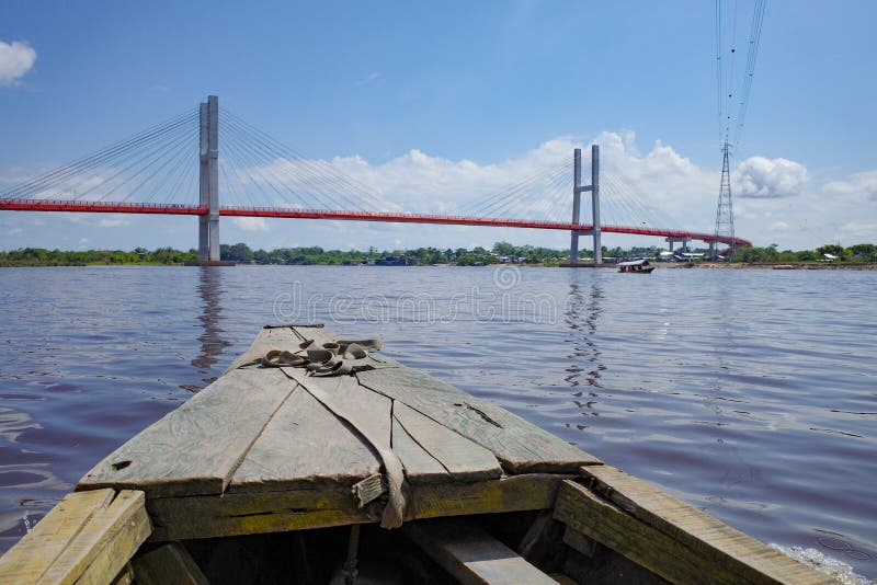 A Suspension Bridge Spanning the Amazon River Near Iquitos, Peru Stock ...