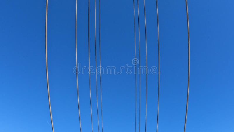 Suspension Bridge Support with Steel Ropes Against Blue Sky and ...