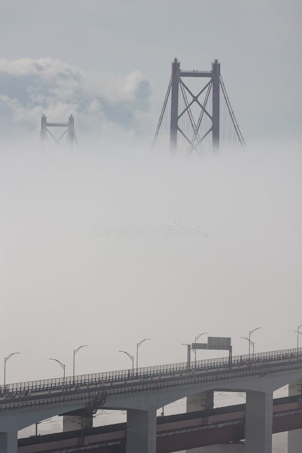 Suspension Bridge in Thick Dense White Fog Stock Photo - Image of ...