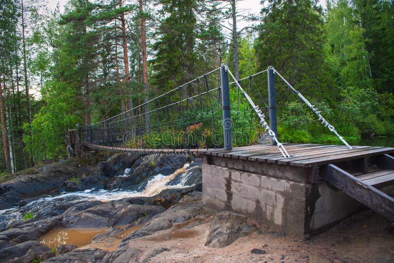 Suspension Cable Bridge Crossing the River Stock Photo - Image of ...