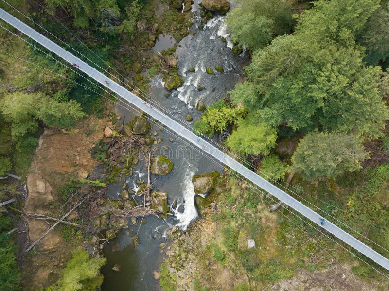 Suspension Walking Bridge Over Wild Water River in Eifel Region. Stock ...