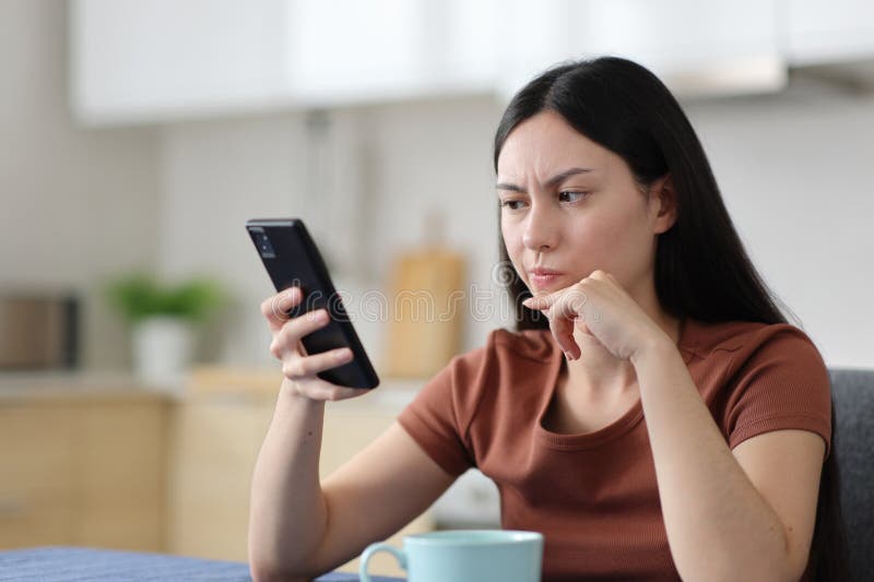 Suspicious Asian Woman Checking Phone Kitchen Stock Photos - Free ...
