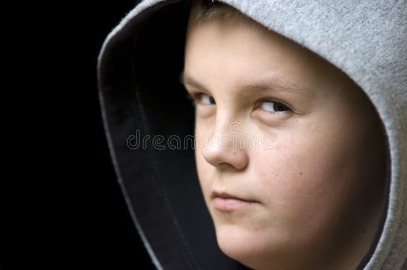 Suspicious hooded boy stock photo. Image of closeup, black - 7257624