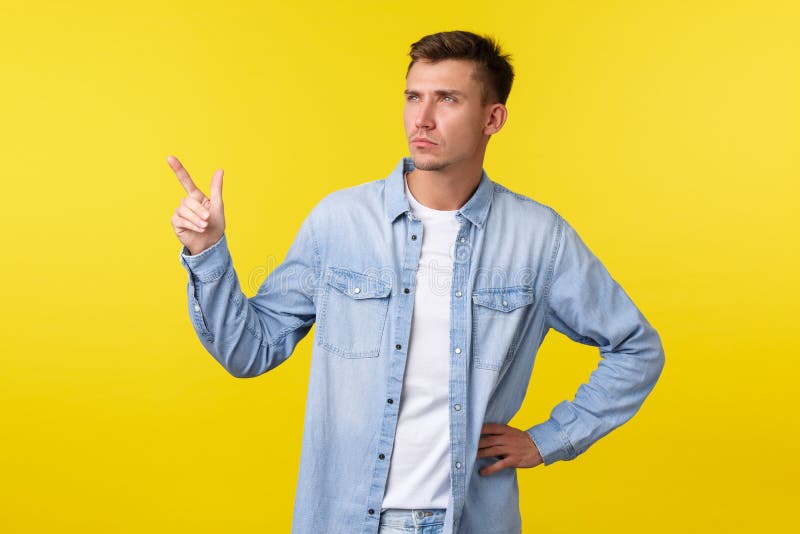 Suspicious and Skeptical Handsome Guy Squinting Doubtful, Pointing and ...