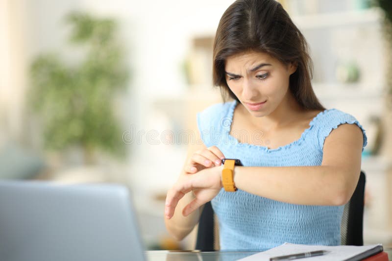 Suspicious Student Checking Smartwatch at Home Stock Image - Image of ...