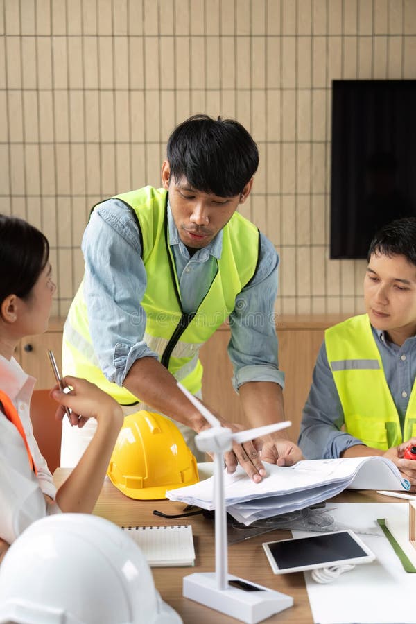 Sustainability and Engineering Discussion. an Engineer Explaining ...