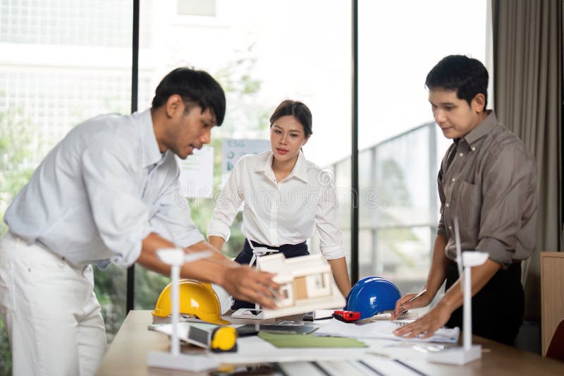 Sustainability in Engineering: Diverse Team Collaborating on Green ...