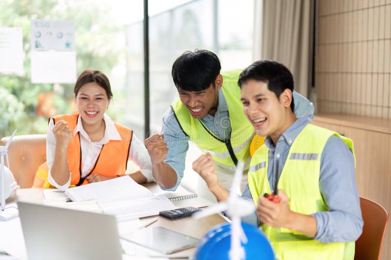 Sustainability and Engineering Teamwork. Engineers Celebrating a ...