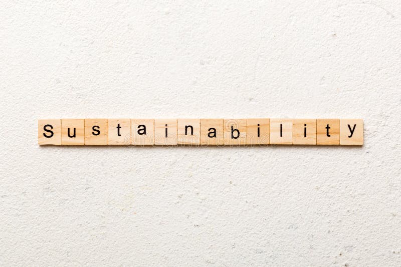 Sustainability Word Written on Wood Block. Sustainability Text on Table ...