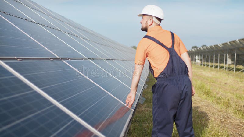 Sustainable Green Energy Jobs, Solar Panel Technician Working with ...