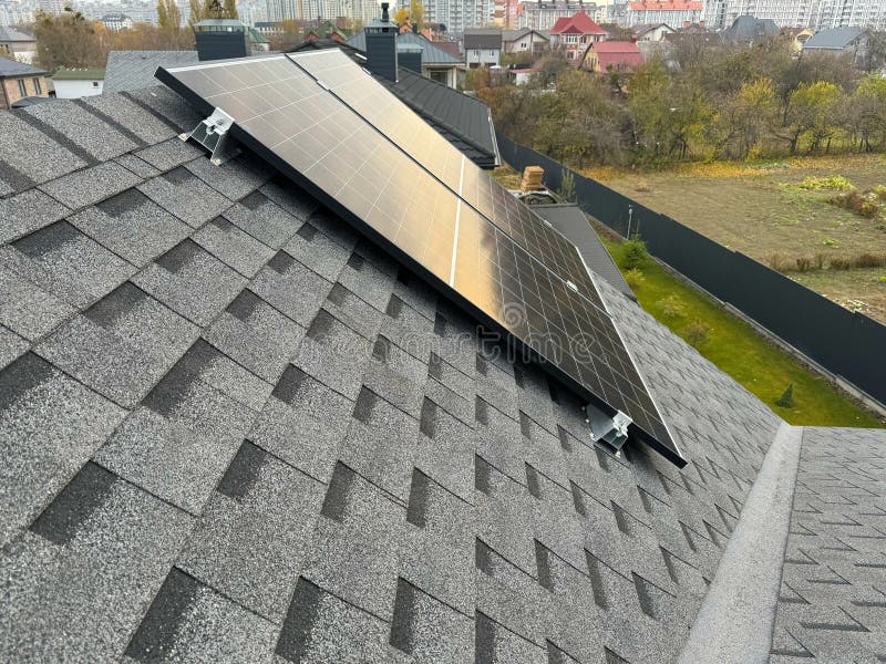 Sustainable Solar Power System Installed on a Homes Rooftop. Stock ...