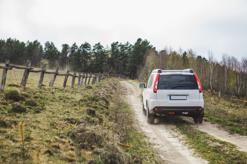 Suv Car Riding by Dusty Country Road Stock Photo - Image of vehicles ...