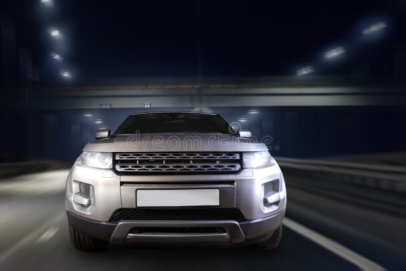 SUV Rides on a Night Suburban Highway Stock Image - Image of sundown ...