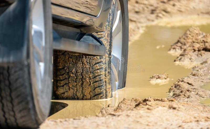 Suv 4wd Car Rides through Deep Muddy Puddle Stock Image - Image of ...