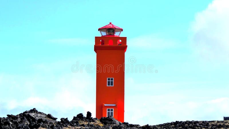 SvÃ¶rtuloft an Orange Lighthouse Stock Image - Image of ocean, water ...