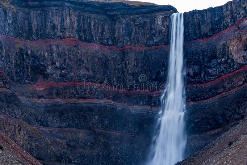 Svartifoss Waterfall and Red Layers in Iceland Stock Photo - Image of ...