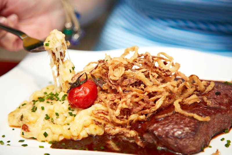 Swabian cuisine stock image. Image of onion, hand, cheese - 26018881