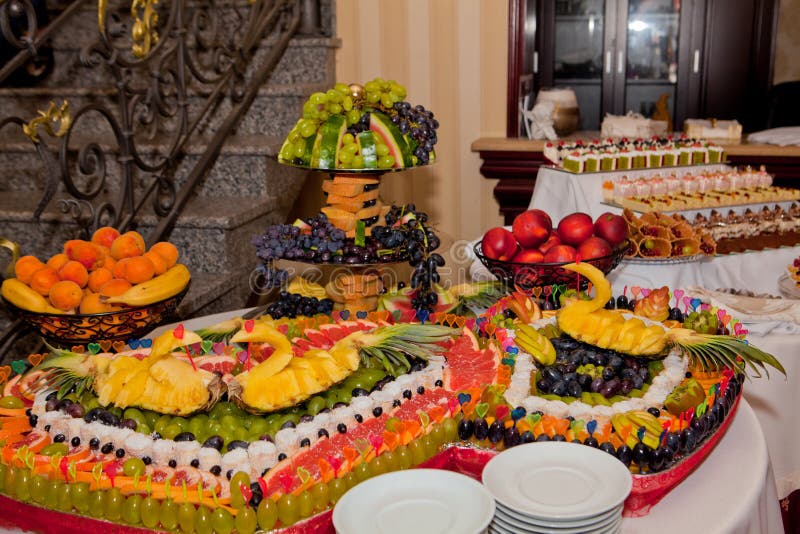 Swan from Pineapple on a Fruit Table, Decor for a Wedding Table Stock ...