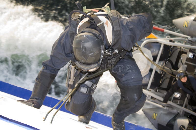 SWAT Agent Decends on Rope from Moving Ship Editorial Photography ...