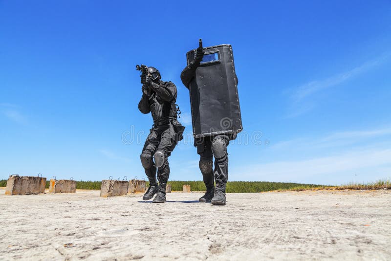 SWAT Officers with Ballistic Shield Stock Photo - Image of spec ...