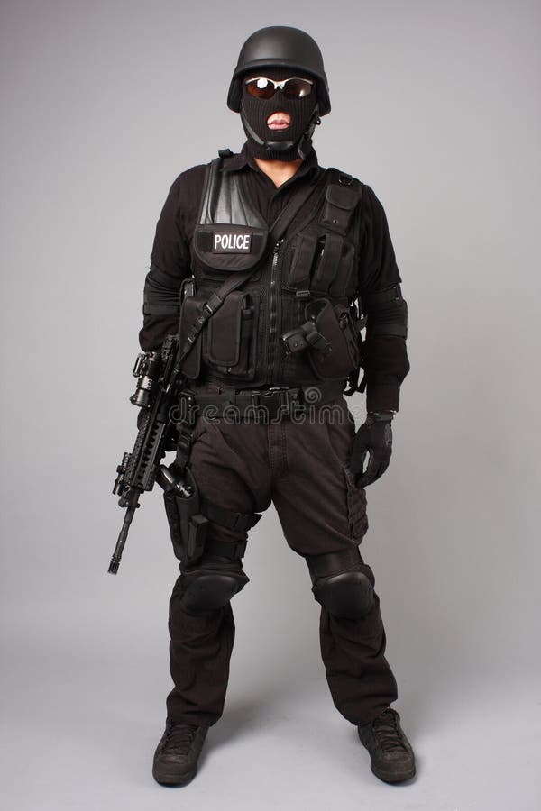 Swat Police Officer Pointing a Gun at the Camera, Isolated on White ...