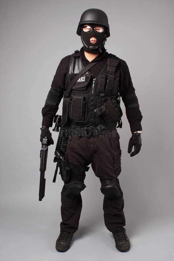 Swat Police Officer Pointing a Gun at the Camera, Isolated on White ...