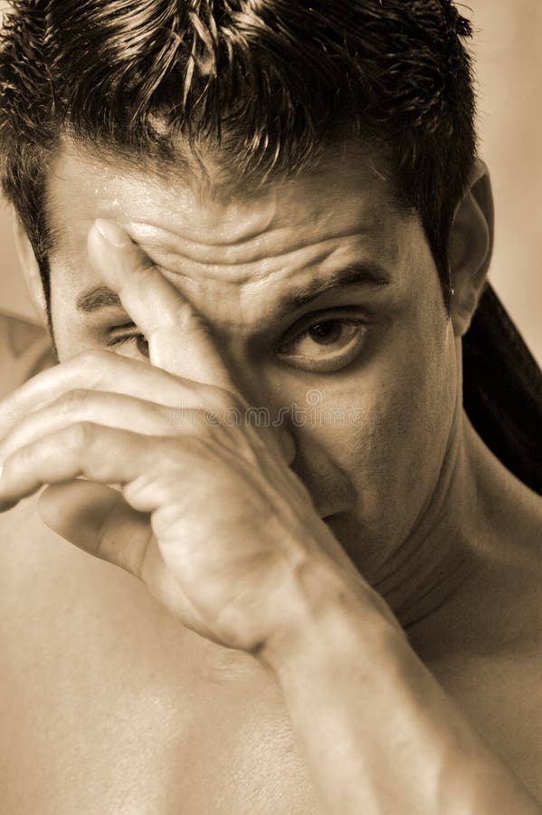 Sweat on his brow stock image. Image of peek, hand, finger - 900241