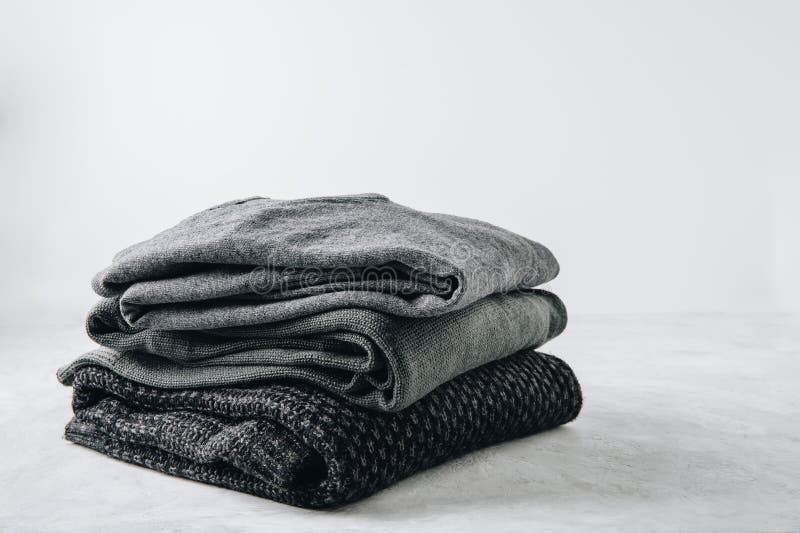 Sweaters. Black Knitted Sweaters on Gray Background Stock Image - Image ...