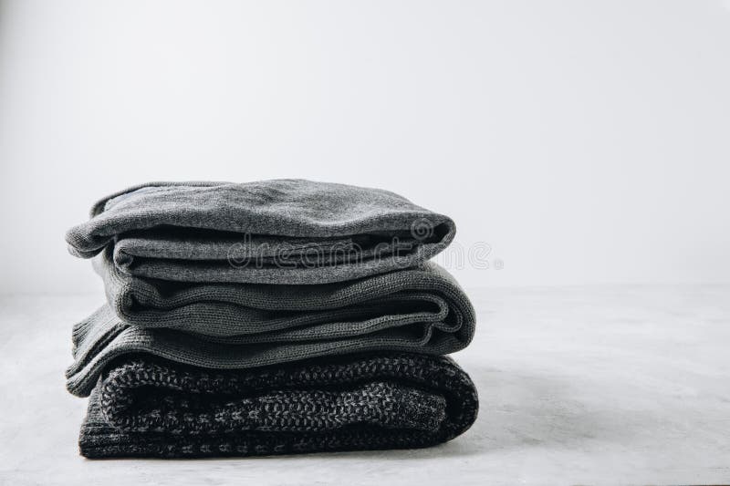 Sweaters. Black Knitted Sweaters on Gray Background Stock Image - Image ...