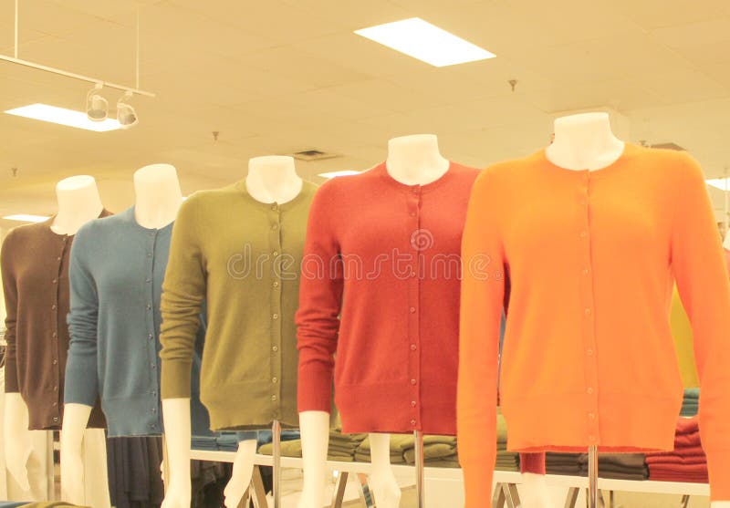 Sweaters in a Store stock image. Image of clothes, blue - 45627303