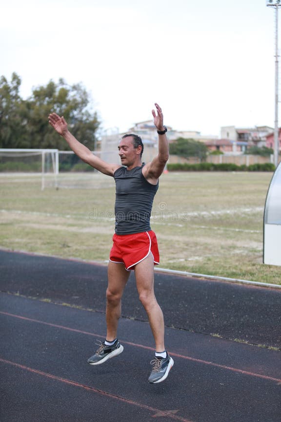 Sweating Athlete Doing Jumping Jacks Stock Image - Image of physical ...