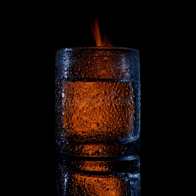 Sweating Glass of Water on a Black Background, Isolate Stock Photo ...