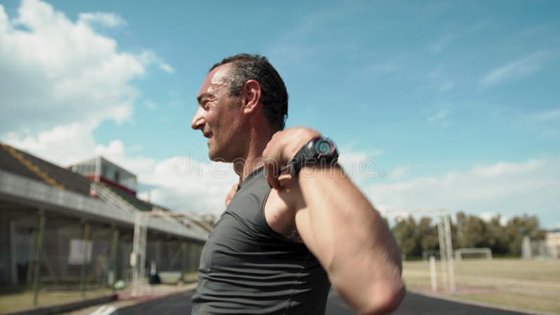 Sweating and Stretching Athlete at the Stadium Stock Footage - Video of ...