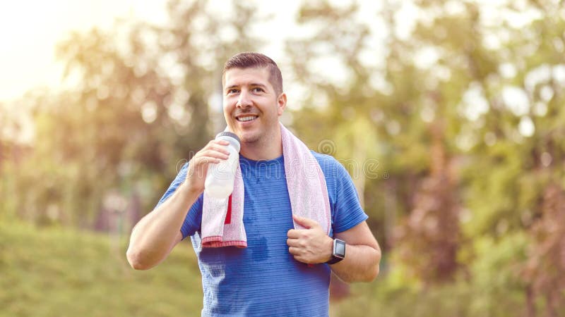 Sweaty Mature Jogger Man Drinking Water after Jogging Stock Photo ...