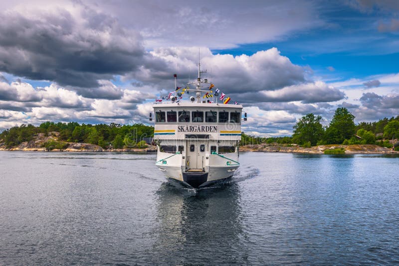Swedish Archipelago - June 23, 2018: a Ferry Boat Approaching a Small ...