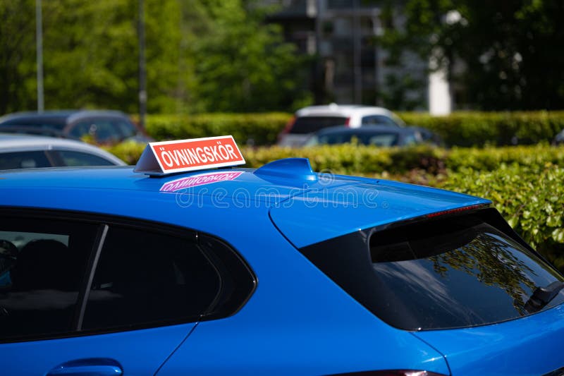 Swedish Driver Training Sign on the Roof of a Blue Car.. Stock Photo ...