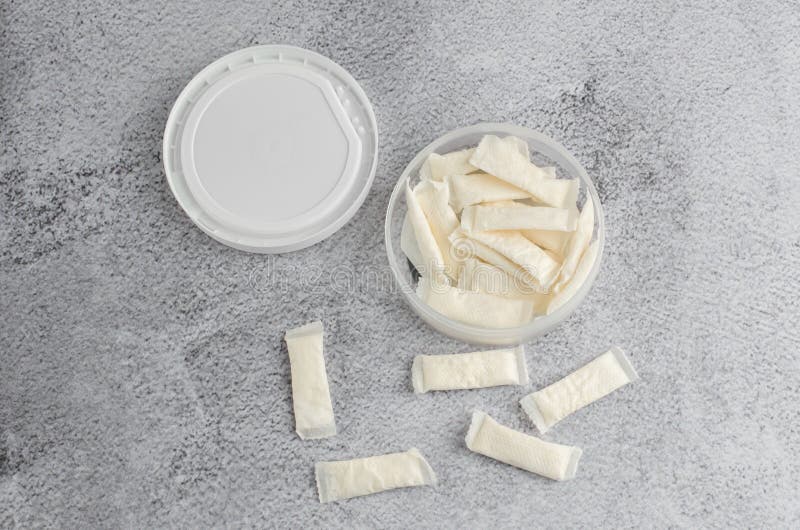 Swedish Snus Nicotine Sachets. Open Box with Snus on a Concrete ...