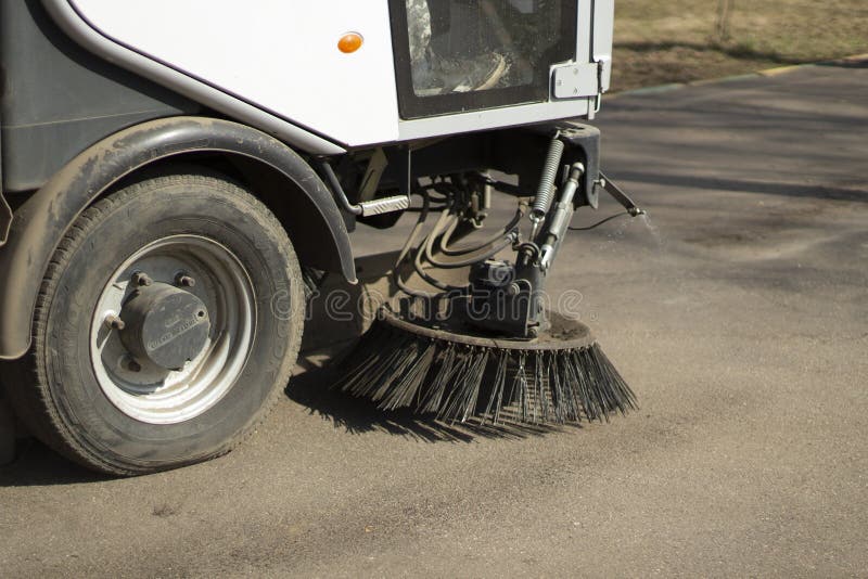 The Sweeper is Sweeping the Asphalt. Cleaning the Path with a Cleaning ...