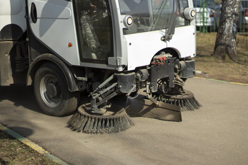 The Sweeper is Sweeping the Asphalt. Cleaning the Path with a Cleaning ...