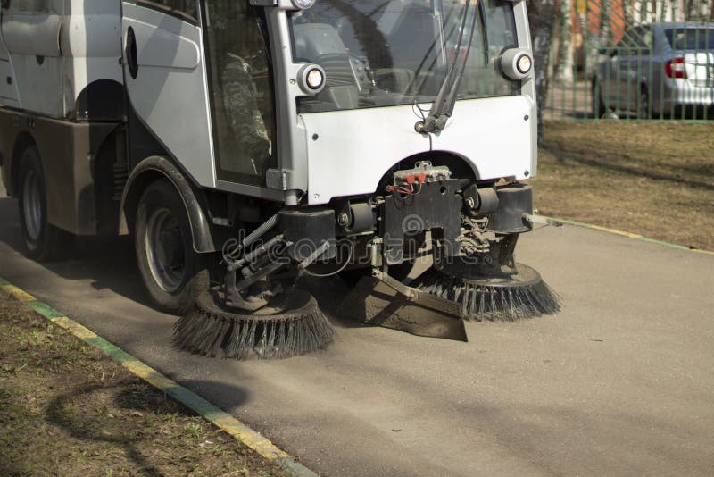 The Sweeper is Sweeping the Asphalt. Cleaning the Path with a Cleaning ...
