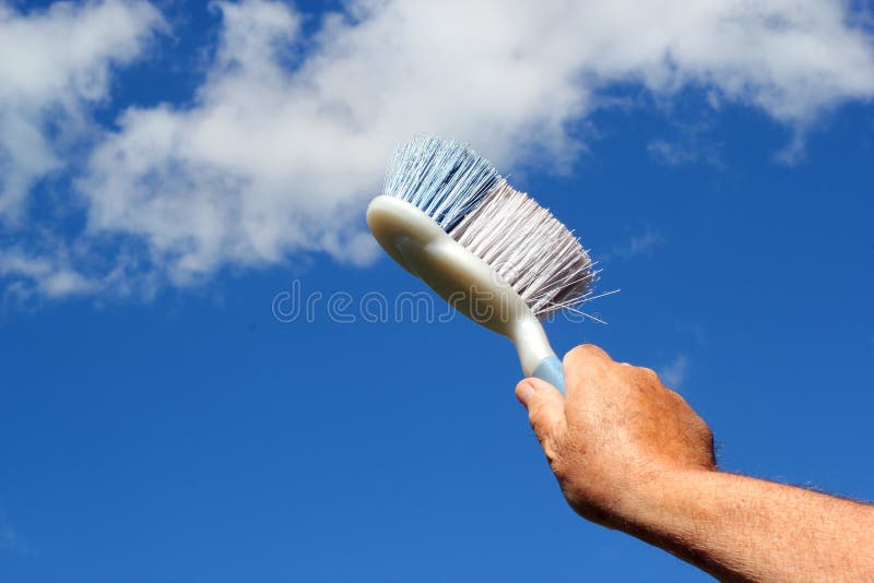 Sweeping away the clouds. stock photo. Image of sweepin - 46458868