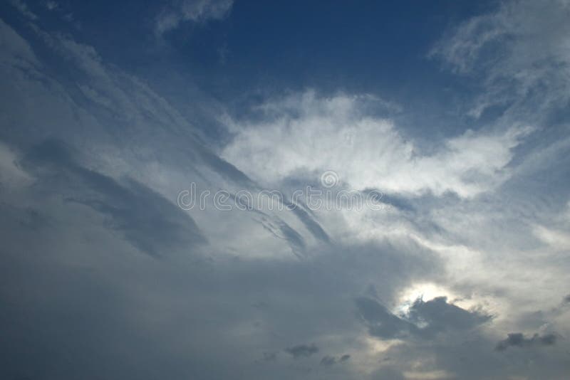 Sweeping clouds in the sky stock image. Image of blues - 104358615
