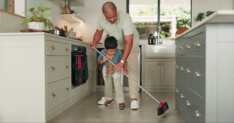 Sweeping, Family and Cleaning Help with Dad and Child in a Kitchen with ...