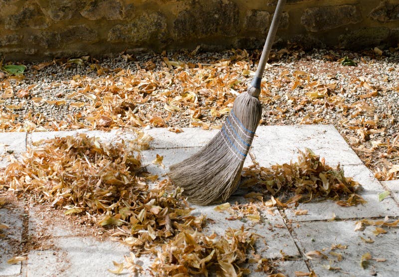 Sweeping leaves stock photo. Image of leaf, tidy, broom - 74755688
