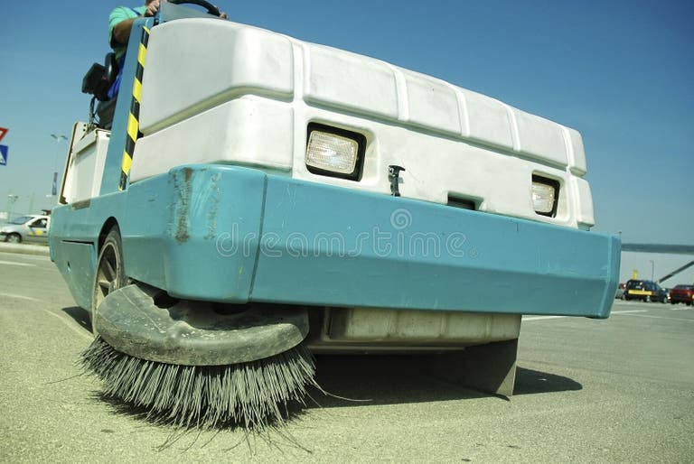 A Sweeping Machine Cleans the Parking Stock Photo - Image of ...