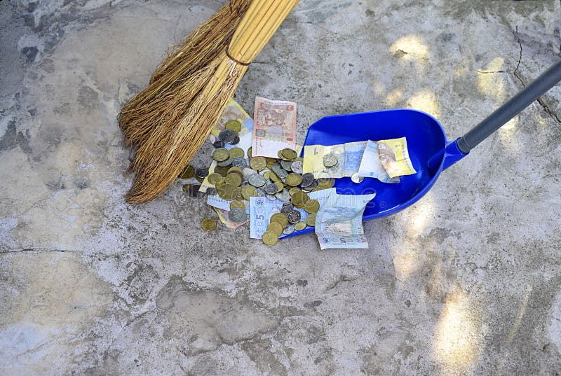 Sweeping Small Money on a Concrete Surface. Stock Photo - Image of ...