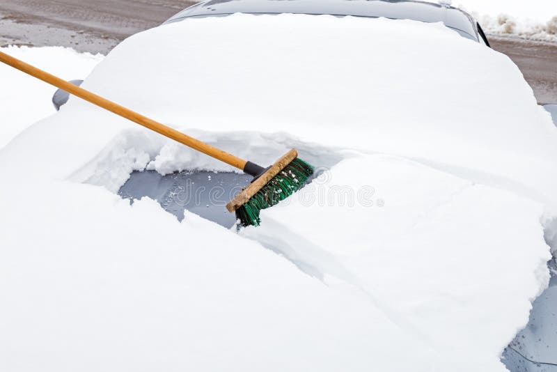 Sweeping snowed car stock photo. Image of windshield - 110548842