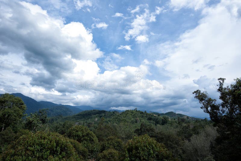 Dramatic Cloudscape Over Lush Forested Hills Stock Photo - Image of dramatic, nature: 380131542